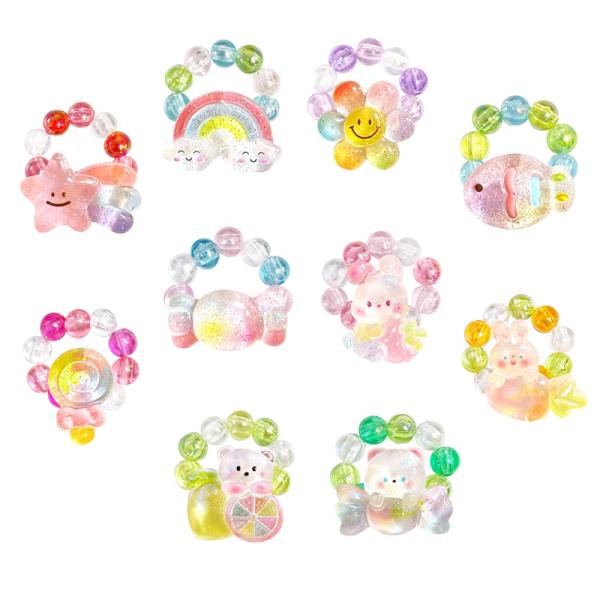 【商品名】ぷっくりバラエティービーズリング【50個セット】【商品サイズ】本体サイズ：H25×W25×D30mm(ゴムが伸びて調整可能)パッケージサイズ：個包装なし。【色】10種アソート。色・柄の指定は出来ません。【注意事項】こちらの商品は業...