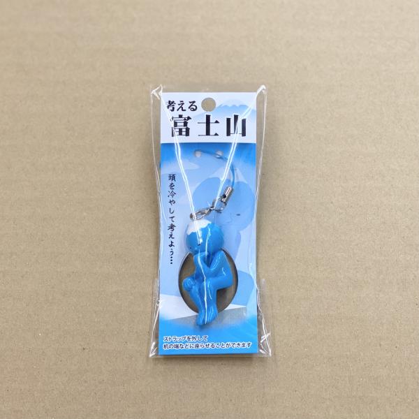 ストラップを外して、机の端などに座らせることができます。