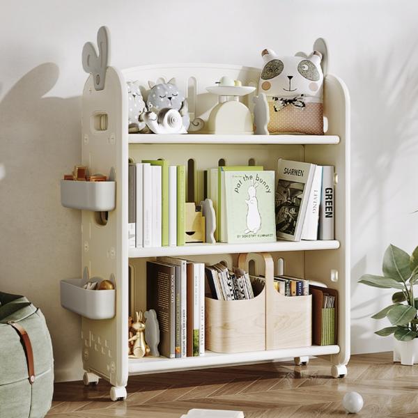 ・商品名：両面使える絵本棚・おもちゃ収納ラック・素材：HDPE（高密度ポリエチレン）、安全・耐久性あり・サイズ：コンパクト設計、子ども部屋でも置きやすい・収納：可動式仕切り付き、大きい絵本から小物まで整理可能・キャスター：360度回転静音キ...