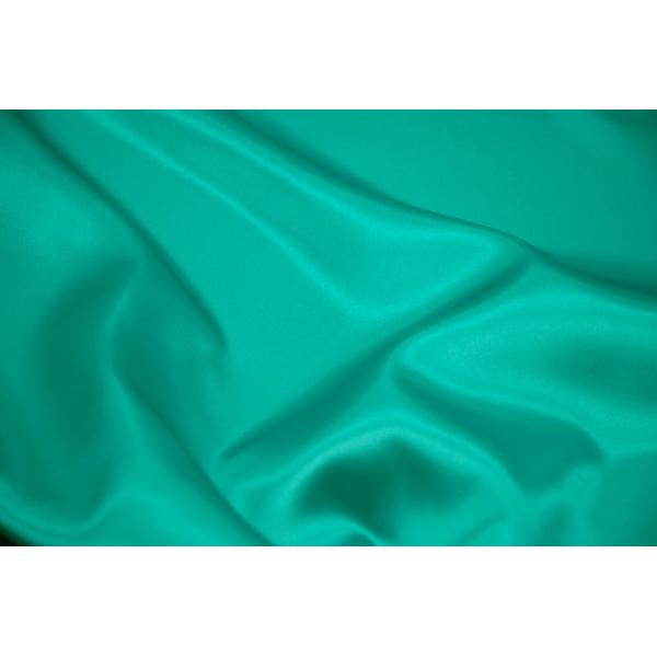 高品質な光沢で発色性に優れたきれいなサテン生地です。手芸生地、洋裁生地などの他、イベント装飾用、ディスプレイの布、撮影のバックなど、様々にお役立て下さい。透け感もあまりなくしっかりしています。写真のボビンは直径約2cmです♪《素材：ポリエス...