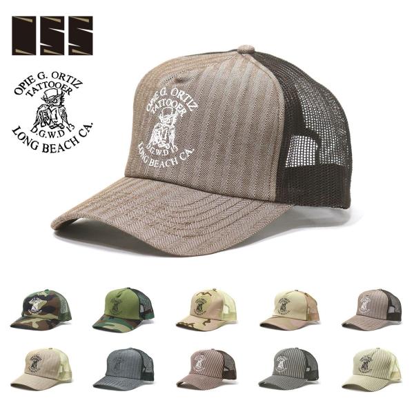 フロントにシルクスクリーンでアートワークが配されたトラッカーキャップになります。055 (LINKAGE) x Opie OrtizLong Beach Dub All Stars のボーカルであり、タトゥーアーとしても活動する TATTO...
