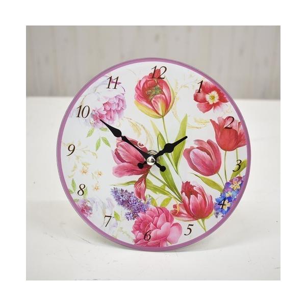 チューリップのイラストが素敵な時計です。置き型と壁掛け型、どちらでもご利用いただけます。これがあるだけで、お部屋がおしゃれな雰囲気になりますね。サイズ：直径17cm素材：ガラス単3電池1本使用（別売）