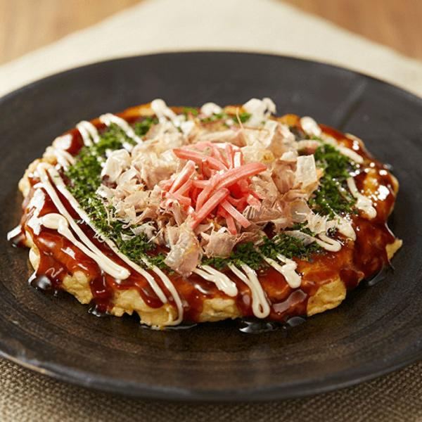 国産キャベツ、国産小麦粉のオリジナルミックス粉、体にやさしいこめ油で揚げた自家製あげ玉が ふっくらとした質感と旨みとコクのある味に仕上げています。生地はふんわり柔らかい関西風お好み焼。定番の豚玉、いかと豚肉入りのミックス、醤油ベースの牛すじ...