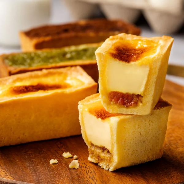 台湾の伝統菓子「鳳梨酥（パイナップルケーキ）」と、なめらかなカスタードを融合させた新感覚スイーツ「鳳梨酥蛋塔（フォンリースー・ダンター）」。香ばしいクッキー生地に、濃厚カスタードと個性豊かなフィリングを組み合わせた、万華ならではの進化系台湾...