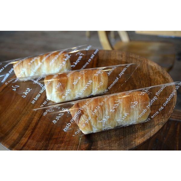 1セット入り数：500枚　 　サイズ　  ：＃30×200×200mm（フィルムの厚さ×横×縦）　　 材質　　 ：OPP（二軸延伸フィルム）　　 特長　　 ：当店オリジナルのドイツ語柄が描かれたOPPシートです。　　　　　　　 「シェーン」...