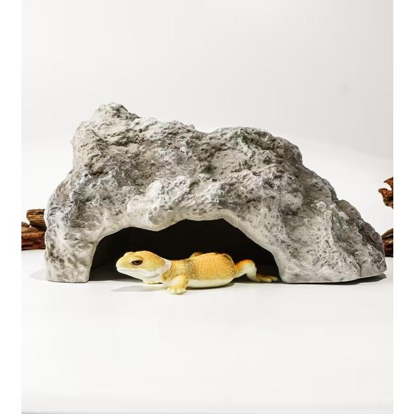 - 多機能な利用：- 素材：PVC-サイズ：13.5cm*9cm*6.5cm-重さ：180g- 隠れ家：リザード、ヤモリ、ヘビなどの爬虫類が安心して身を隠せるスペースを提供。- 休憩・脱皮場所：表面の粗い質感が脱皮を助け、また日向ぼっこや休...