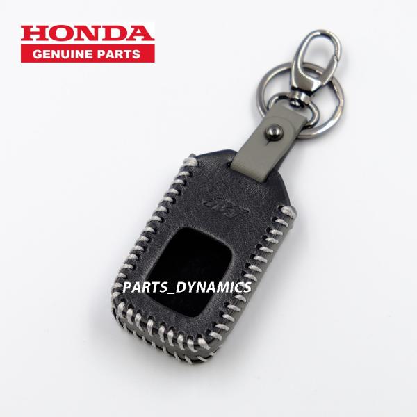 【適合車種】■車種名：ホンダ車用【商品内容】■セット内容：Modulo 海外ホンダ純正 スマートキーケースカバー ブラック 1個■カラー：ブラック x グレー x ホワイト■素材：本革製■サイズ： ホルダー部分 縦 7.9cm x 横 4c...