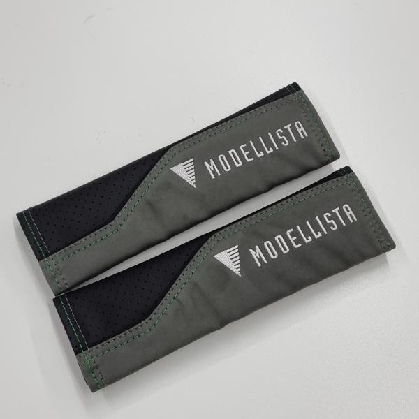 【適合車種】■車種名：トヨタ全車種 ■適合グレード：全グレード【商品内容】■セット内容：MODELLISTA トヨタオフィシャルアクセサリー シートベルトパッド 2個■カラー：グレー（スエード調） x ブラック (パンチング加工） x ホワ...