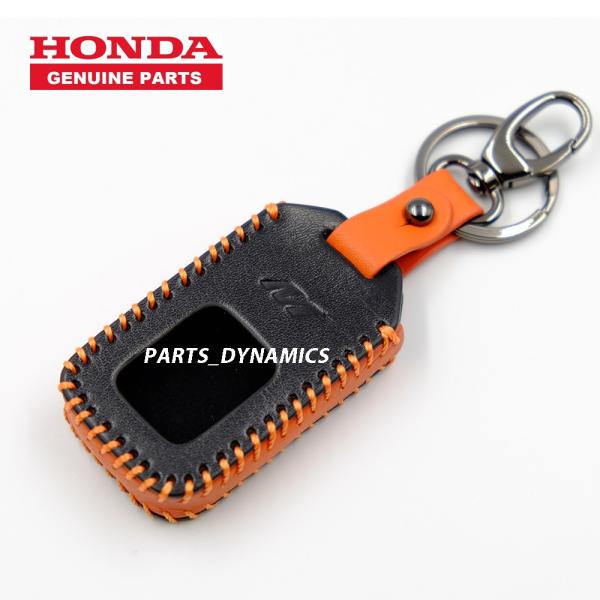 【適合車種】■車種名：ホンダ車用【商品内容】■セット内容：Modulo 海外ホンダ純正 スマートキーケースカバー ブラック x オレンジ 1個■カラー：ブラック x オレンジ■素材：本革製■サイズ： ホルダー部分 縦 7.9cm x 横 4...
