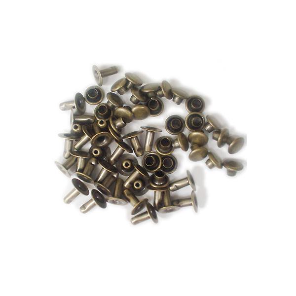 頭(メス)の直径6mm、足(オス)7mmの真鍮製の小カシメの足並です。真鍮製。片面タイプ。足軸径2.5mm。革や布の厚みが厚み5mm程度の場合にお勧めです。3mm程度の場合は足短をご検討ください。