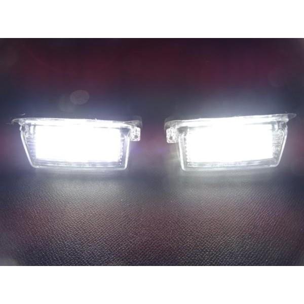 商品説明＞　大好評♪高品質♪売り切れ御免！！のキャンセラー内臓LEDナンバー灯（ホワイト）です。純正の電球色のナンバー灯を真っ白に変身させる必須アイテムです！もちろん電球だけではなく、レンズもクリアカットですのでバルブだけの交換では味わえな...