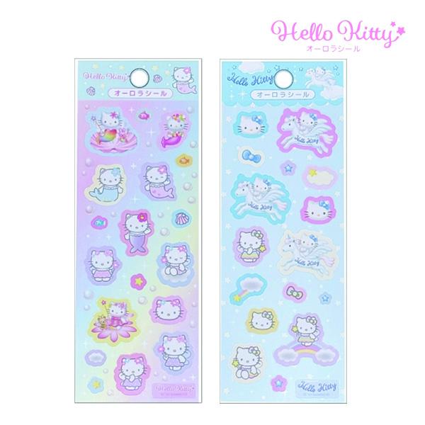 オーロラ加工がかわいい！ハローキティのオーロラシールが登場です。マーメイド＆フェアリー・ペガサス＆フェアリーの2パターン展開。携帯・手帳などなどデコっちゃおう！サイズ：約H170×W60×D1mm販売サイズ：約H172×W62×D2mm素材...