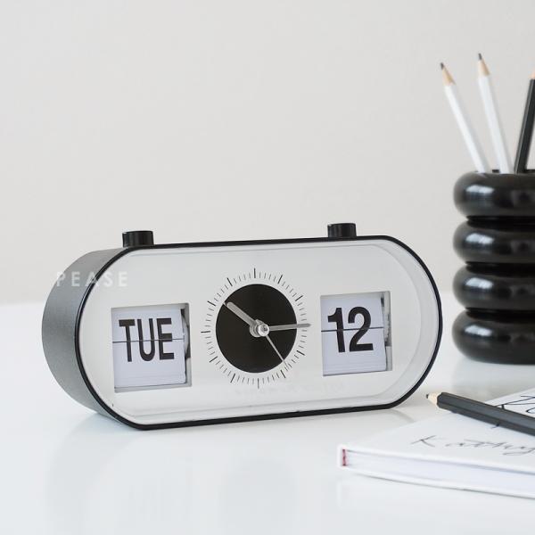 シンプルなモノトーンカラーのデザインをのアラーム付き置き時計です。手動でカレンダーの日付と曜日を変更できるボタンがついているので、これにより毎日の日付と曜日を正確に設定できます。このアラーム付き置き時計は、リビングルーム、ベッドサイドテーブ...