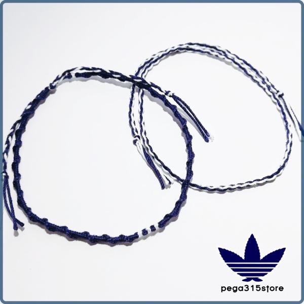 足用ミサンガです。オールドスクールな３本ラインのスポーティーなデザインです♪スポーツMIXやクラッシックHIPHOPスタイルに是非♪長さ：約３５ｃｍ（三つ編み部分：6.5ｃｍ センター部分：19ｃｍ）素材：刺繍糸色：紺（ネイビー）・白※お使...