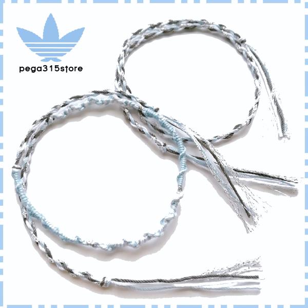 足用ミサンガです。オールドスクールでスポーティーなデザインです♪スポーツMIXやクラッシックHIPHOPスタイルに是非♪マーブルMIXツイードカラー４POINTラメ長さ：約３５ｃｍ素材：刺繍糸色：水色　スカイブルー・ホワイト・グレー・シルバ...