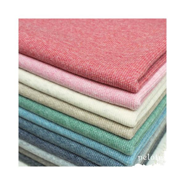 【10cm単位の販売】伸縮性抜群の着心地のいいニット生地です。きれいにフィットしたＴシャツやカーディガンにぴったりです。裏毛やその他のニットと合わせて、袖口や首ぐり、裾などにリブ使いにすると、とってもオシャレ♪透け感のない中肉の生地で、伸び...