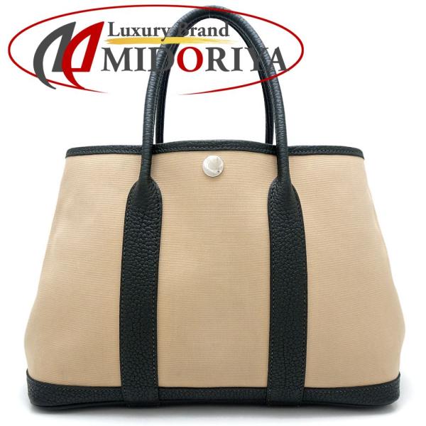 ■商品情報取扱店舗：銀座店 (TEL03-6264-4880)状態：中古ABランク素材：トワルオフィシエ / ネゴンダ色：TRENCH / VERT FONCE / シルバー金具サイズ：W30cm×H21cm×D14cm開閉：スナップボタン...