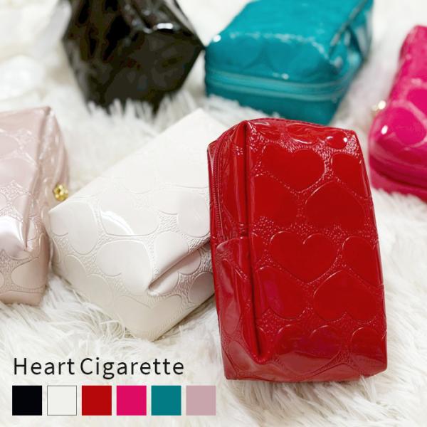 つやつやのエナメル素材にハートの型押しデザインがおしゃれ♪ハートの引き手がさりげないポイント。内側には小さな物を分けて入れられるミニポケットが１つついています。タバコを入れるのはもちろん、デジカメやコスメ、小物を入れてもOK！・サイズ約 Ｗ...