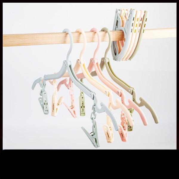 (1)長持ち： 携帯ハンガーはPP素材で作られて、丈夫で錆に強く、劣化しにくく、長持ちします 。(2)携帯便利： この携帯ハンガーは折りたたむタイプで、折りたたみの後のサイズは小さくて、旅行、出張に携帯便利です。折りたたみ後のサイズは手のひ...