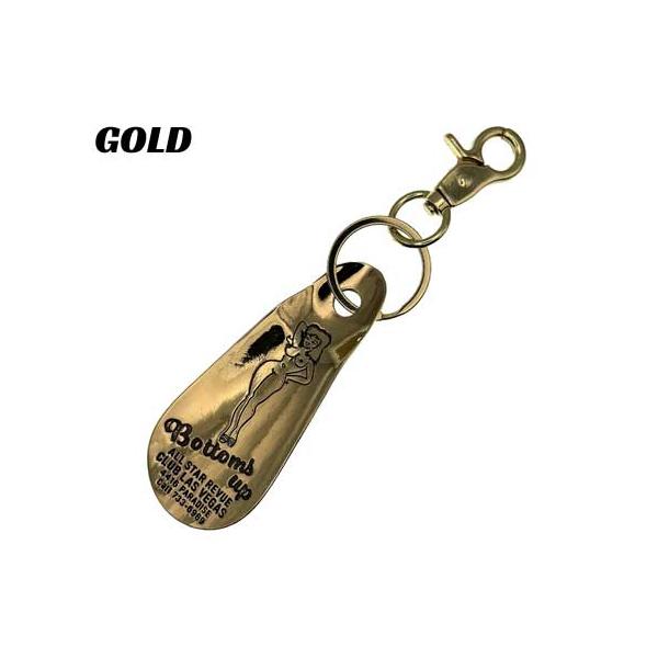 シューホーンキーホルダーになります。靴ベラ型にカットされたヴィンテージライクなキーフックです。セクシー美女のヌードデザインが刻印されてさらにCQQLでしょう！もちろん靴べらとしても使えるので便利です。素材はビンテージの靴ベラ同様の亜鉛合金製...