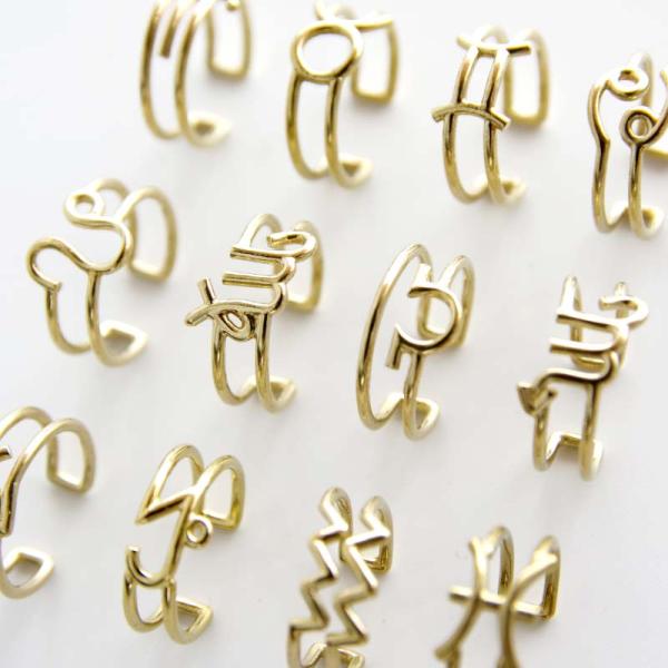 12星座のモチーフのサイズフリーリングです。耳にイヤカフみたいにも付けれちゃう優れもの。多少のサイズ調整も可能なので、ギフトや男性のご使用もおすすめです。■ブランド　Aquvii(アクビ)■サイズ　free■材質　真鍮 ,ステンレス■備考　...