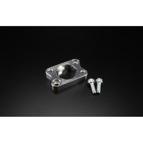 メーカー名：ジークラフトメーカー品番：37111キタコDOHC（88cc、125cc）用のマニホールドスペーサーです。このスペーサーを使えばGcraft可変マニホールドの使用が可能でキャブレターの自由度が増します。29mmのポート形状から楕...