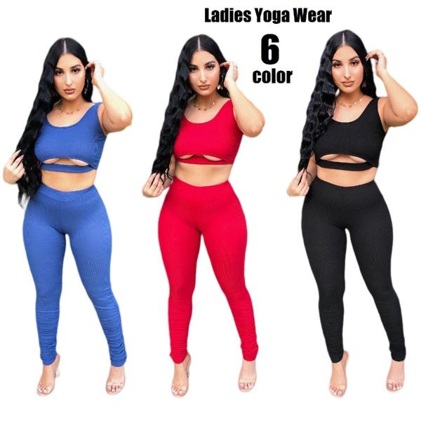 レディース用ヨガウェアです。ショート丈のタンクップ＆レギンスパンツの上下セット！タンクトップは涼し気な穴あきデザインになっています。シンプルで動きやすく、エクササイズやフィットネスなどの運動時にもぴったりです◎【サイズについて】画像をご参照...