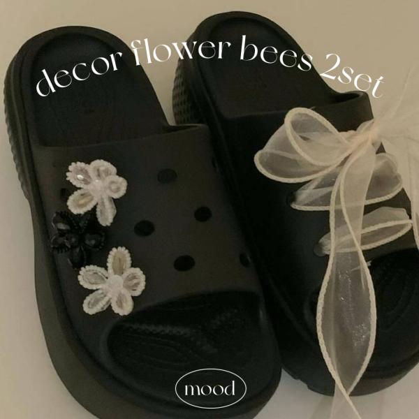 足元をおしゃれに演出するシューパーツ2個セット（各色×1）です。可愛い花が靴やサンダルを彩ります♪【セット内容／2個セット】アイボリー×1、ブラック×1【原産国】韓国@plusnao_mood【サイズについて】（直径）約3.5cm・測り方に...