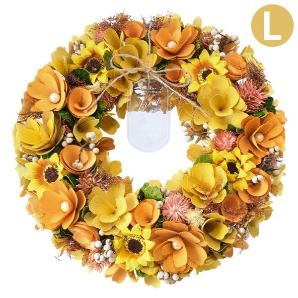 元気いっぱい鮮やかな黄色が目を惹く、夏にぴったりのリース。飾るだけで広大なヒマワリ畑にいるような気分に♪【透明プレートの訳】PETIT FLEUR・小さな花GARDONS LE SOURIRE：笑顔でいようArome：香りnature：自然...