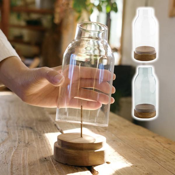 ガラスの曲線が映える、灰のこぼれないお香立て。どんなインテリアにも自然に馴染むフォルム。ガラスカバー付きだから風の影響を受けず、お項の灰が周りに飛び散ることがありません。【サイズ】本体サイズ：約直径75×高さ160mmガラス：約直径73×高...