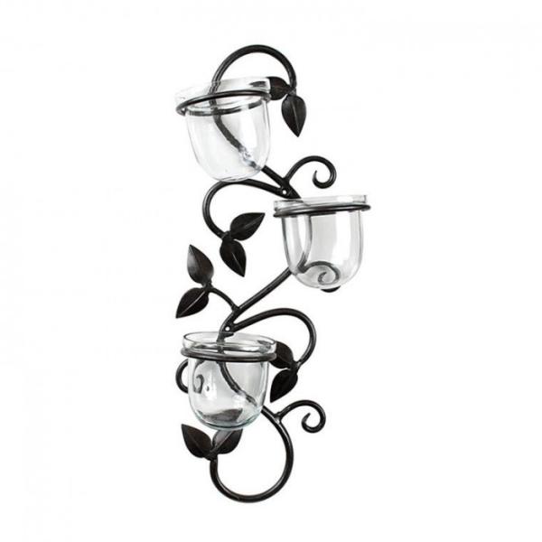 お部屋や庭の壁面に取り付けて、植物などをディスプレイするのに便利なフラワーベースです。植物のつるを模したアイアン製のウォールデコレーションとなります。エアープランツや多肉植物などを飾ってお楽しみください。 生産国:インド 商品サイズ:幅13...