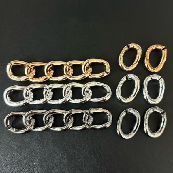 繋いでチェーン状にして使うパーツです。キーホルダーやバッグチャームなどにこちらの商品は製造の工程で、一部の箇所が黒くなっております。カラー プラチナシルバーローズゴールドガンメタブラック15個セットサイズ: 29x21x9mm穴：11x19...