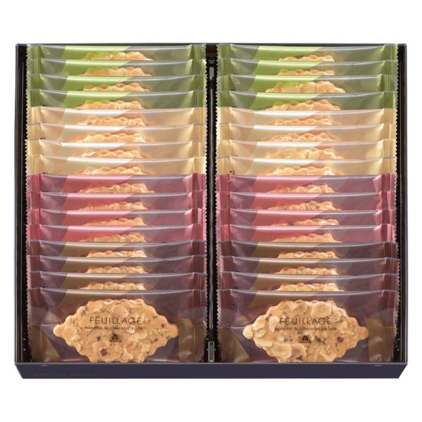 フランス語で「木の葉」を意味するクッキー。スライスナッツをしきつめてパリッと香ばしく焼き上げたクッキーにバランスよくチョコレートをサンドしました。チョコレートはナッツに合わせて相性のよいものを厳選。クッキーとナッツとチョコレート、それぞれの...