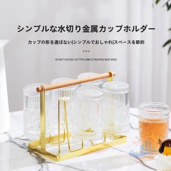 素材 本体:アイアン、バー:天然木、ストッパー:シリコン樹脂、先端部品:シリコン樹脂【北欧風のグラススタンド】ナチュラルな北欧風の木材を用いた安定性のあるグラススタンドです。底部は長方形の形でしっかりと作られているので、コップを置いても転ぶ...