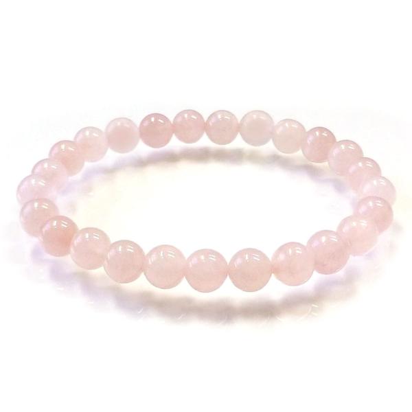 石の大きさ：約8mm玉内径：約 16 cm※この商品はアソート品です。※写真と同ロットの商品をお送りします。やさしいピンク色が特徴のローズクォーツは、愛と癒やしを象徴する天然石として人気があります。古代から美と愛の女神に捧げられてきた歴史を...