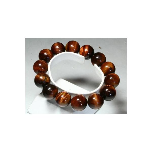 ◆重さ：54g◆サイズ：16cm◆石の大きさ：13〜14mm径◆玉数：14◇中国産※現品撮影です。写真の商品をお届けします。◎この商品はメール便送料無料商品です。力強い輝きを放つタイガーアイは、古代から“神の眼”とも称され、洞察力や守護の象...