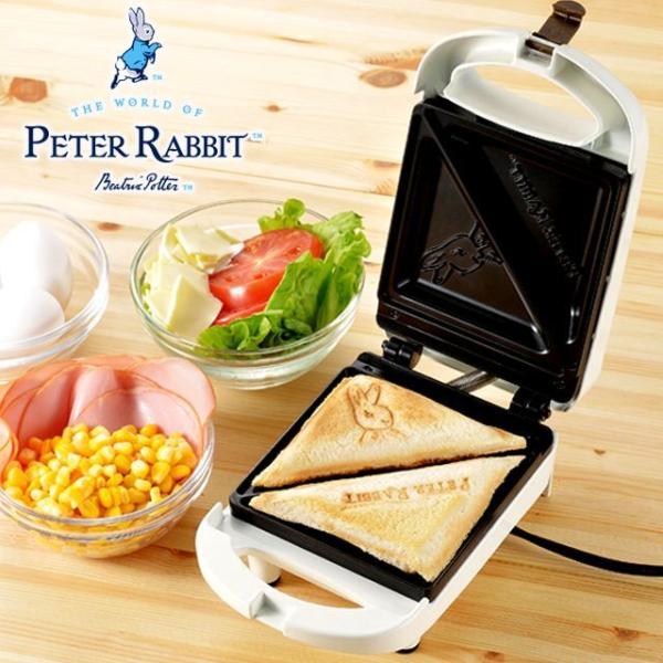 ピーターラビットの焼き印でかわいいホットサンド朝食を♪好きな具材をパンで挟んで蓋をして待つだけで、ピーターラビットの絵柄とロゴが表裏に焼印されたホットサンドイッチの出来上がりです♪プレートはフッ素樹脂加工でお手入れも簡単！！ハムにチーズ、ツ...