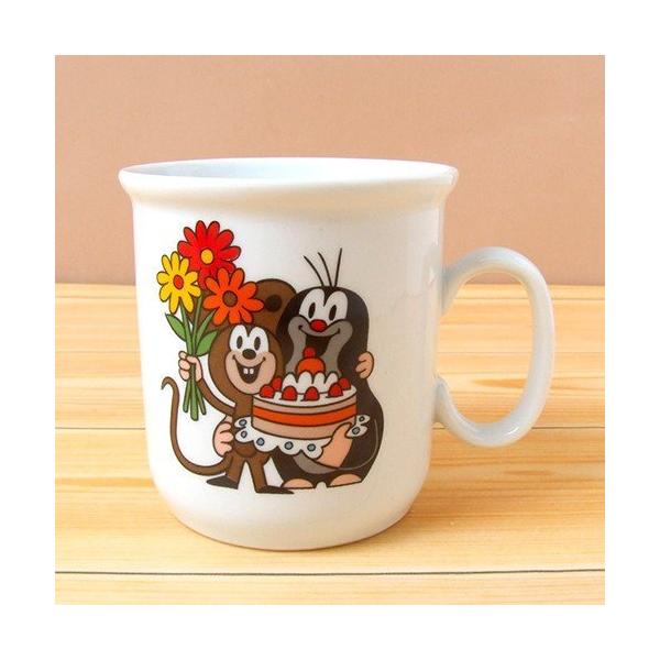 かわいいケーキときれいなお花をいっぱい抱えたクルテクとネズミくんがとっても嬉しそうなイラストのマグカップです。カップの裏側にもケーキのイラストがワンポイントで入っています。小さめのサイズなのでちょっと一息つく時のカップに丁度良さそうです。■...