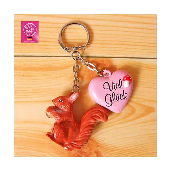 木の実を両手で抱えて食べる姿がとても愛らしいキーホルダーです。一緒に付いてるハートにはドイツ語でViel Gluck(=Good luck!)の文字入り。 ハートのピンクとキノコがどこか懐かしい色合いで雰囲気が出ています。ALFI社は昔から...