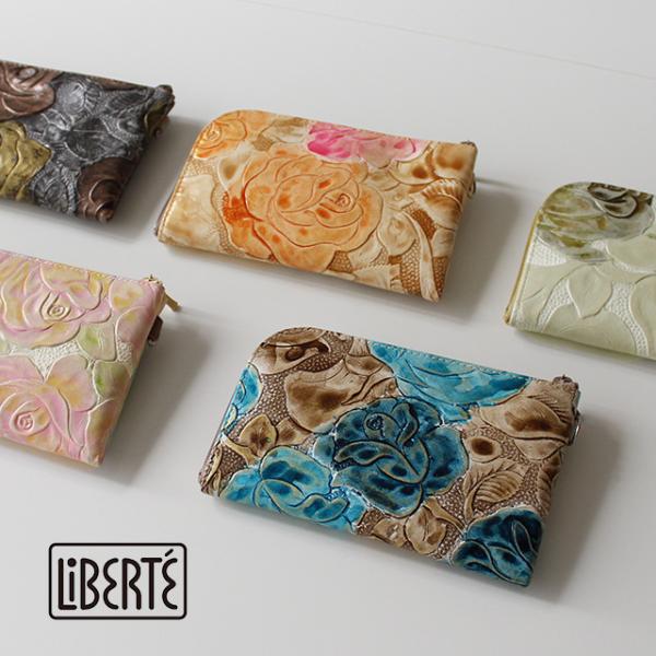 大胆なバラの型押しが目を引く大人のスマート財布牛革にバラの型押しを施し職人が丁寧に手作業で彩色しています。咲き誇るバラのように美しい財布は持っているだけで心が弾みます。片手に収まりやすい長さのコンパクト財布です。二つ折りにした紙幣・小銭・カ...