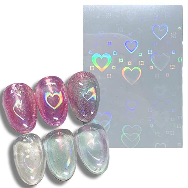 ハート、星の模様のシートです。お好きな大きさにカットしてネイルに埋め込んでご使用ください。A両面に薄い保護フィルムがあります。（ロットによって片面の場合もあります）そちらを剥がしますと片面はシールになっています。が接着力は強くはありません。...