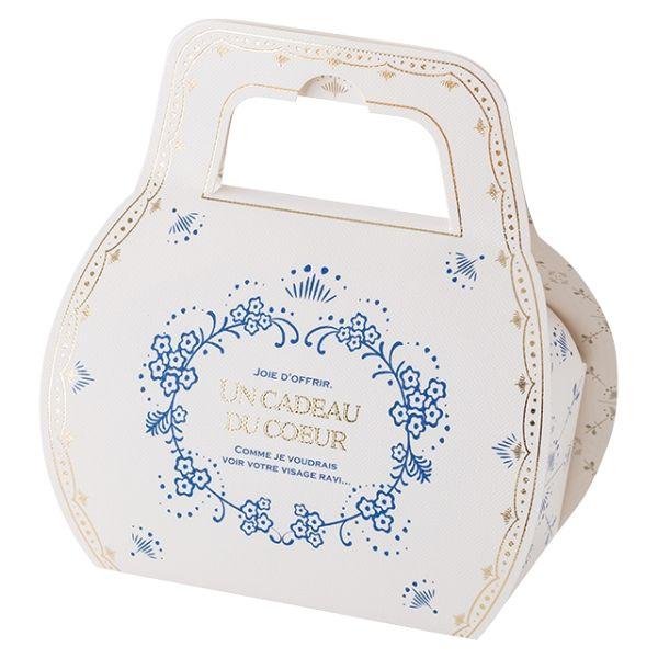 白地にネイビーとゴールドをあしらった高級感漂うロワイヤルシリーズのバッグ型ギフトボックスです。自立する丸いフォルムはギフトを大きく見せる効果があります。きらりと輝く金箔がギフトの価値を高めるボックスです。ハンドル付きで手に取りやすいのもポイ...