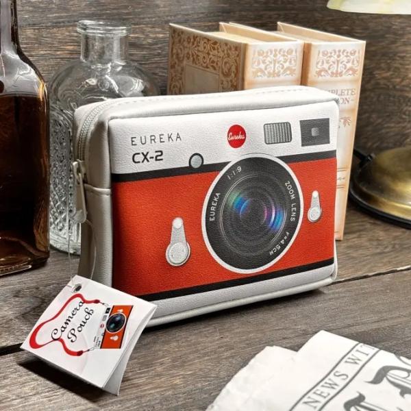 税込価格　７８８円ケース入数　１２JAN　4573279474965内容量　２４ｇ賞味期限　8ヶ月（製造日起算）商品サイズ　W140×H105×D45(ｍｍ)ケースサイズ　W290×H115×D280(ｍｍ)デジタルカメラデザインのポーチで...