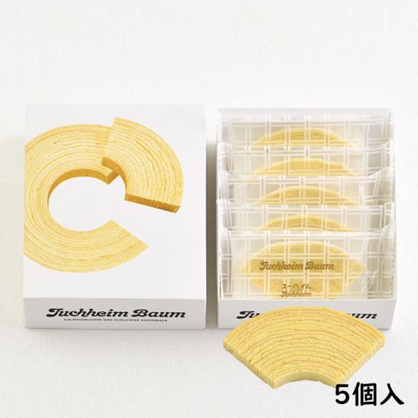 【商品概要】 ユーハイムバウム 5個　袋付き主な原料は、卵と小麦粉、砂糖、国産バター。乳化剤や膨張剤を使わずにしっとりと香り豊かに焼きあげた。バウムクーヘンを、おいしいバランスの厚さ15mmにカットしました。個包装入りで手土産にも最適。素材...