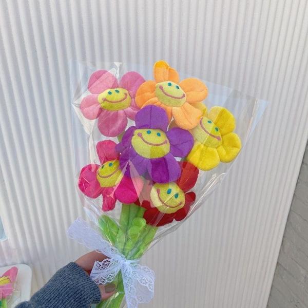 素材ポリエステル 綿入りぬいぐるみ ワイヤー入りサイズ全長30cm/お花幅11cm数：8本入韓国で人気の枯れないお花ぬいぐるみのスマイルフラワー可愛いくて枯れることがなくお部屋にずっと飾れるのでプレゼントにもピッタリです茎部分にワイヤーが入...