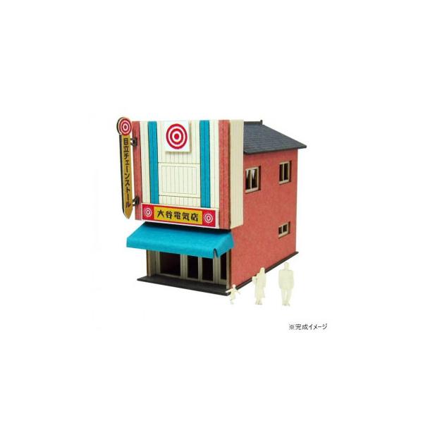 電気屋さんのキットです。町中にありそうな看板建築の電気屋さん。白、水色、茜色のストライプがいい感じです。大きな袖看板や、建物を並べた時にチラッと見える壁面の茜色もいいです。おまけで人形3体が付いています。人形はカラーペンで着色がオススメです。