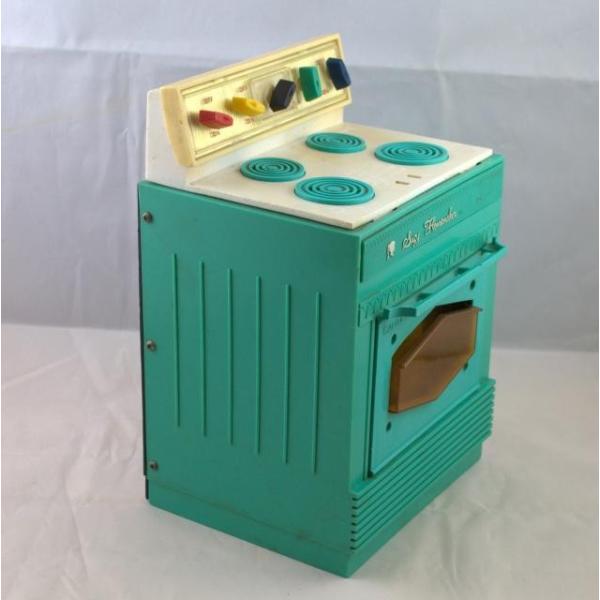 プラスチック製のとってもカワイイ、おもちゃのキッチンオーブンレンジSUZY HOMEMAKERです。コンロとレンジが付いていて,開閉用のコンセント差込口があり、コンセントを差し込むとドアが開きます。電球があって、点灯するようになっていたよう...