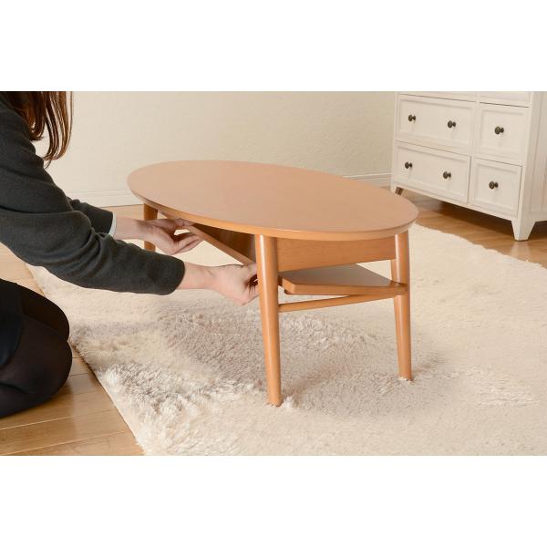 【発売日：2022年08月19日】こだわりの天然木の質感を楽しめる折り畳みテーブル。楕円形のちょうどよいサイズのテーブルです。脚を折りたたむと厚さ12cmのコンパクトサイズになり、ソファの下や家具の隙間に収納可能です。カラー：ウォッシュホワ...