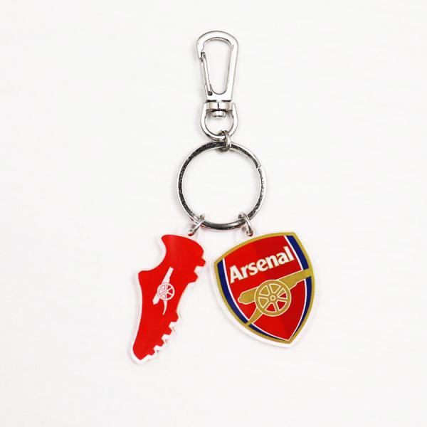 クラブ公式ライセンス商品英プレミアリーグの名門　アーセナルFCエンブレムとシューズの2連チャームサイズ:全長約10cm素材:アクリル他●追跡可能メール便　対応可