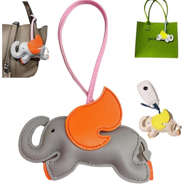 バリエーションコード : 2B9KJ6OPDK1. 「大人可愛いデザイン」このバッグチャームは、グレーとオレンジの象モチーフが特徴で、大人の女性にぴったりの可愛らしさを演出します。シンプルなバッグに付けるだけで、一気におしゃれ度がアップし、...